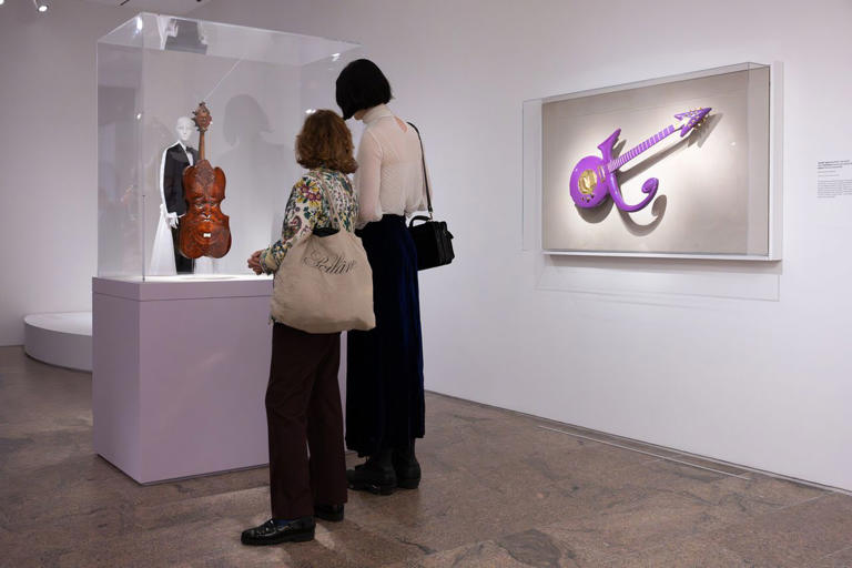 Prince's love symbol guitar hangs in the Metropolitan Museum of Art as ...