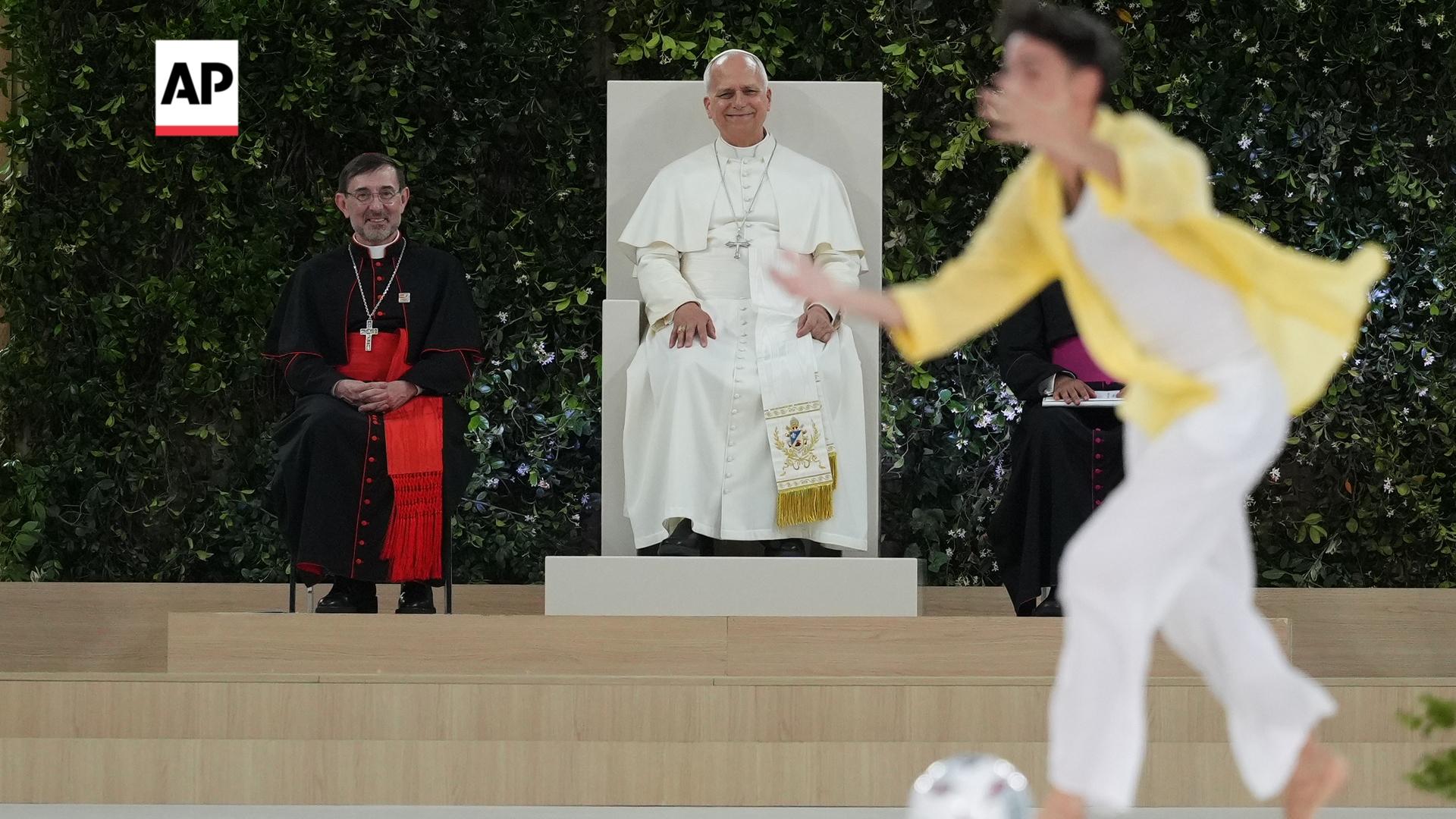 Pope Leo is greeted by enthusiastic crowds at soccer stadium in Madrid