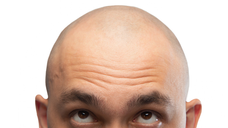 What really happens to a man's body when he shaves his head