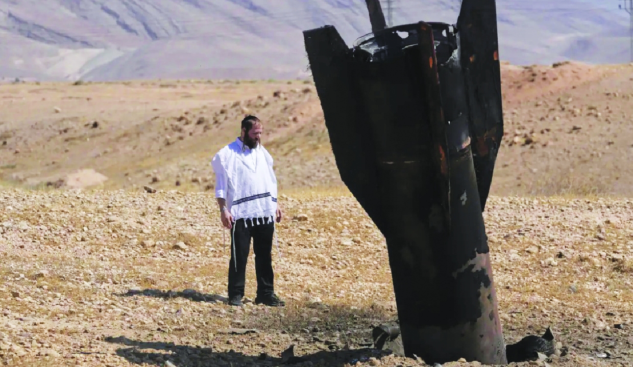 Iran steps back, warns Israel of war