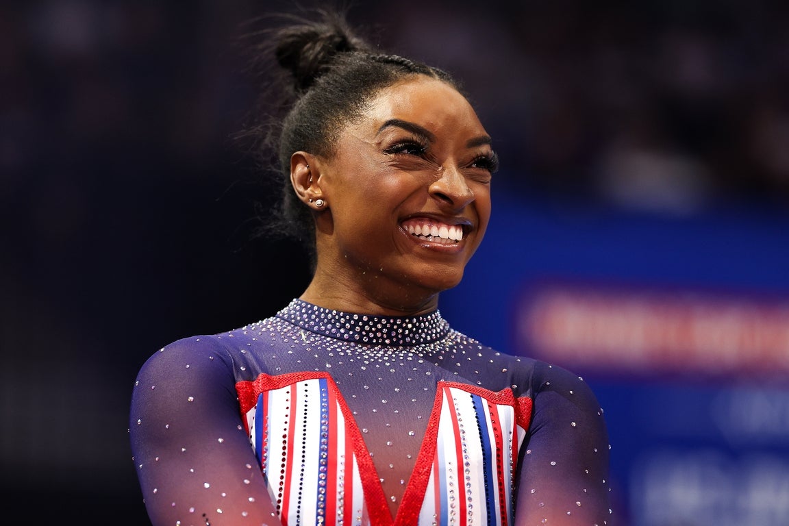 Simone Biles, gymnastics legend and SI swimsuit model, in photos