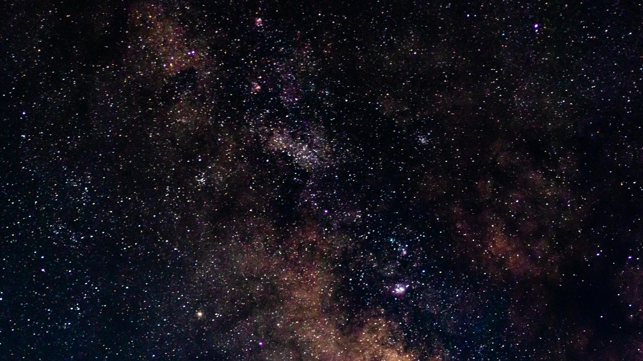 Space is completely silent, because there is no air to carry sound