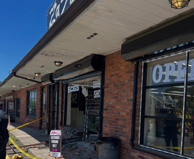 Car plows into East Haven convenience store