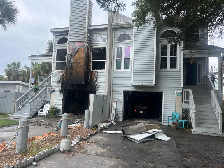 Volunteers search Tybee marshlands for missing dog after duplex fire