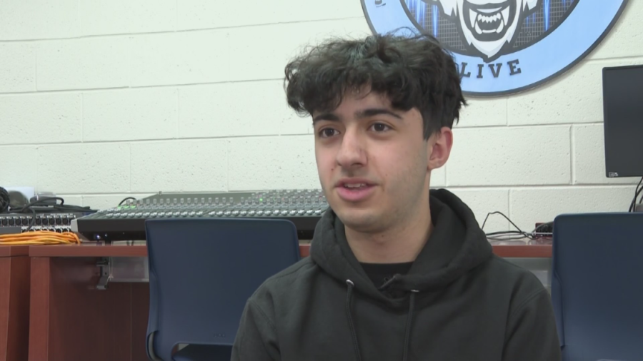 High school graduate sets example