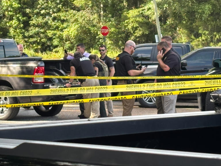 Two suspects wanted after Covington County deputy shot near supermarket