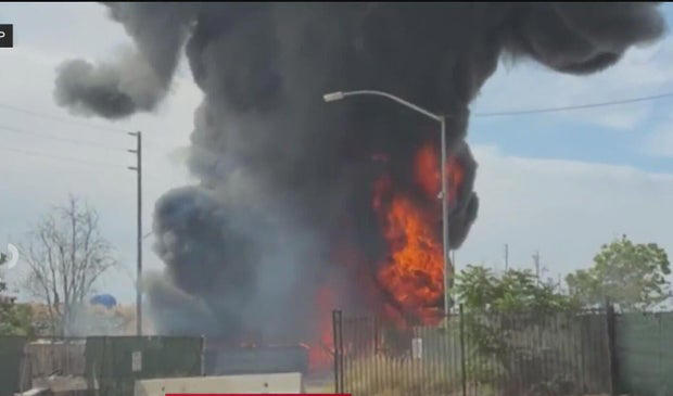 Crews battle large debris fire in Long Beach near a construction site
