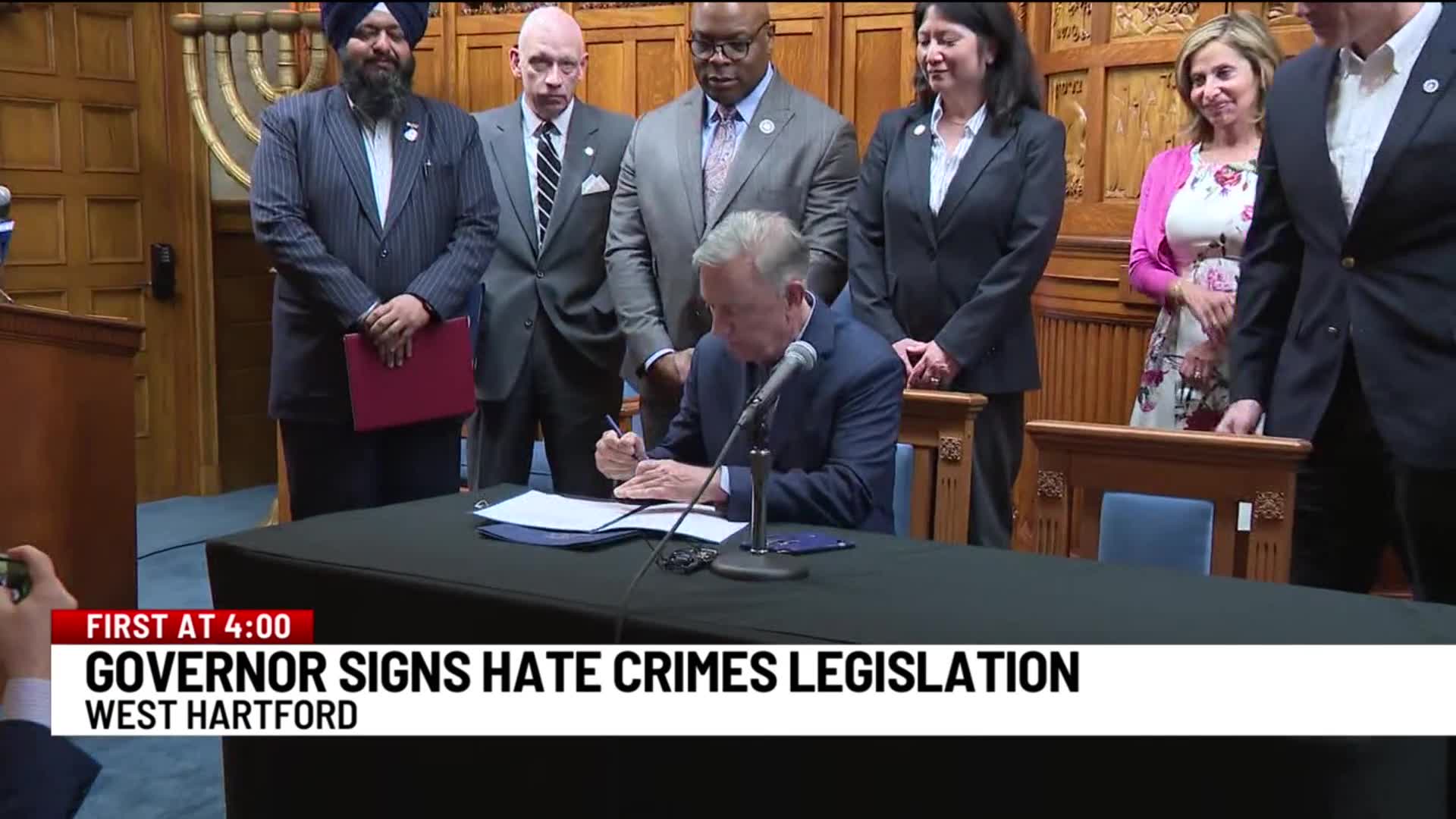Lamont signs law to streamline process for charging criminals with hate ...
