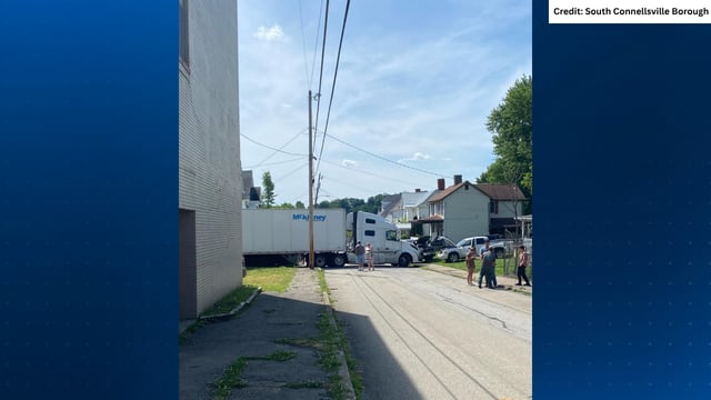 Crews work to remove jack-knifed trailer from road in Fayette County