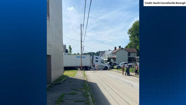 Crews work to remove jack-knifed trailer from road in Fayette County