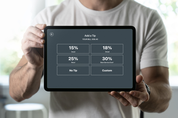 Survey shows backlash against digital restaurant tipping