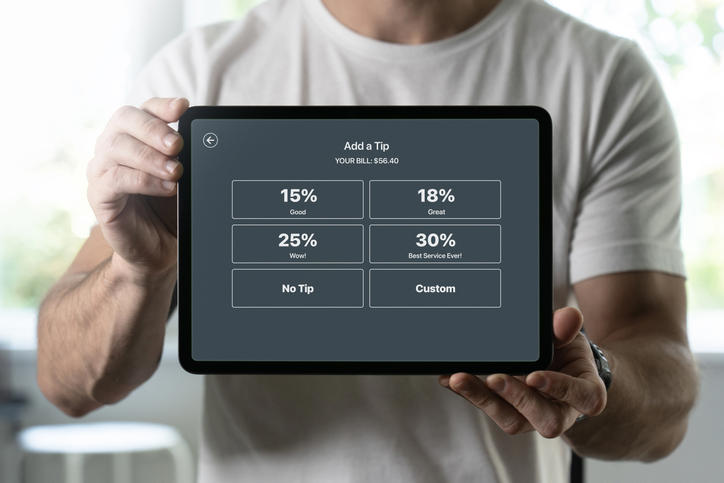Survey shows backlash against digital restaurant tipping