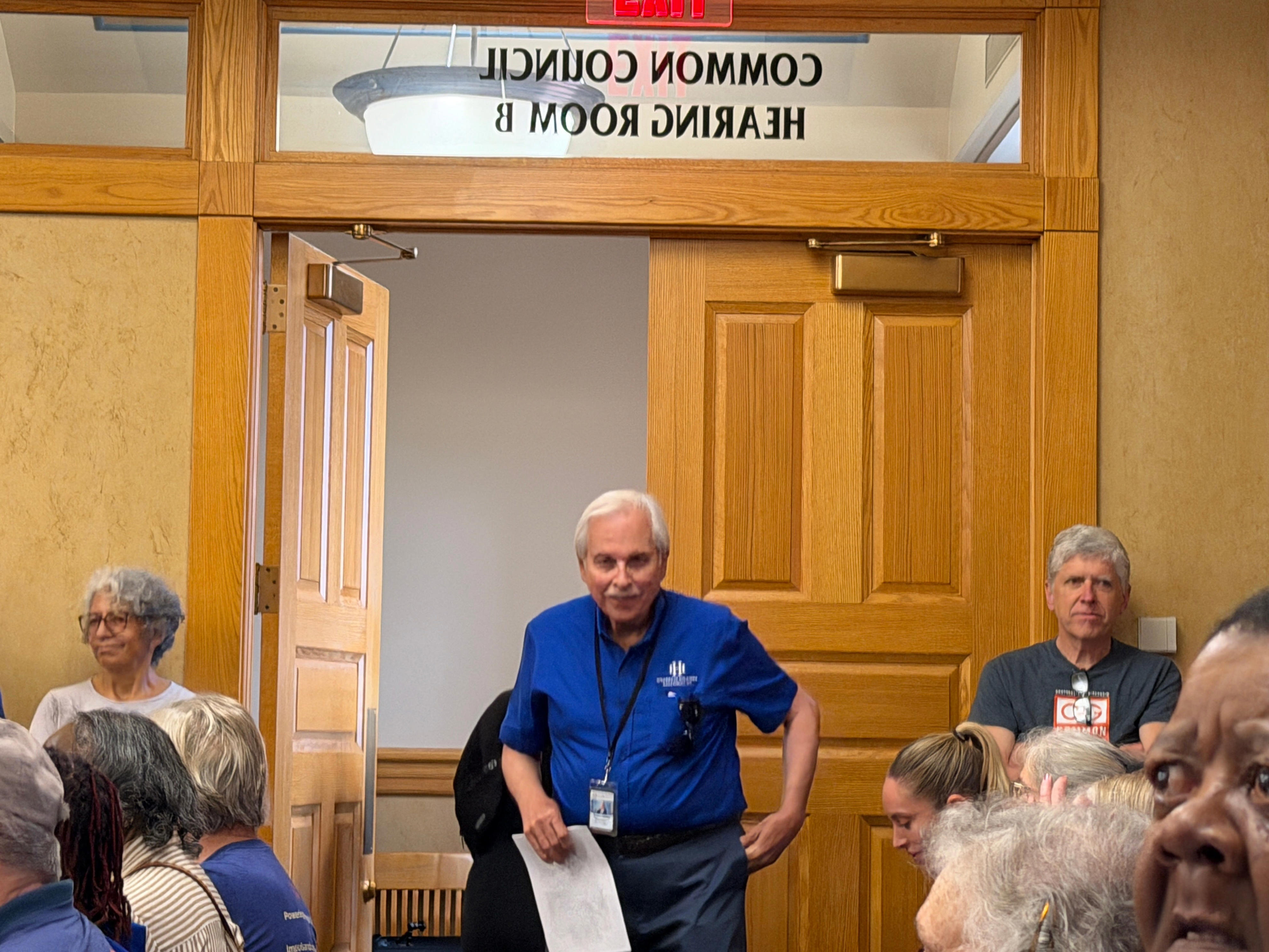Embattled landlord's presence at city meeting leads to confrontation