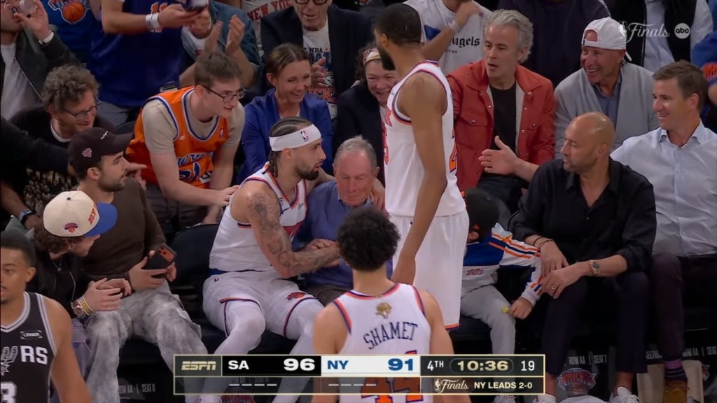Knicks guard Jose Alvarado plows into former NYC Mayor Bloomberg during ...