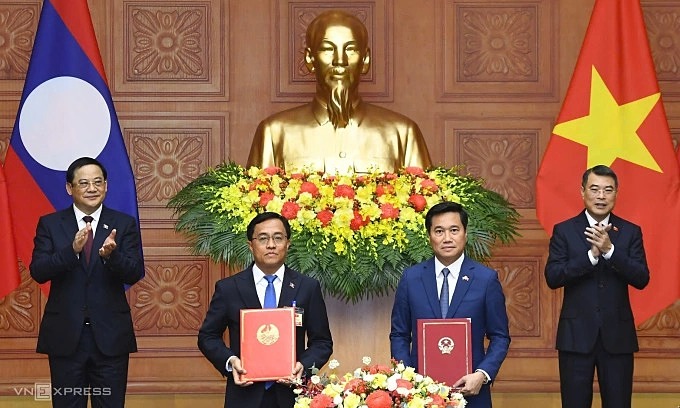 Vietnam, Laos sign cooperation agreement to enhance financial ...