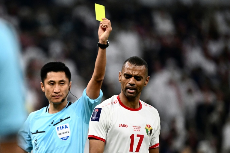 Success-starved China fans adopt 'Card Master' referee as World Cup rep