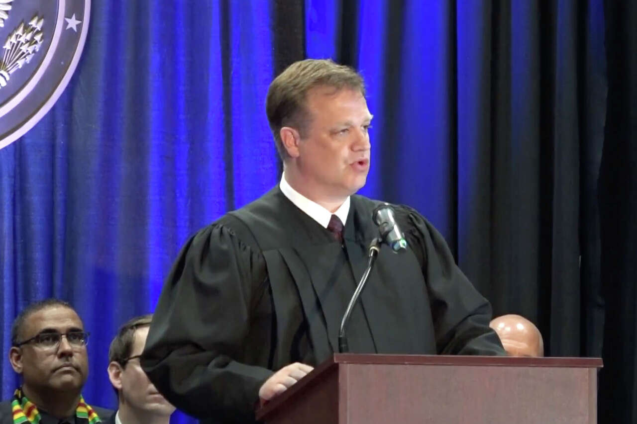 Sunglass-stomping appeals court judge charged with battery