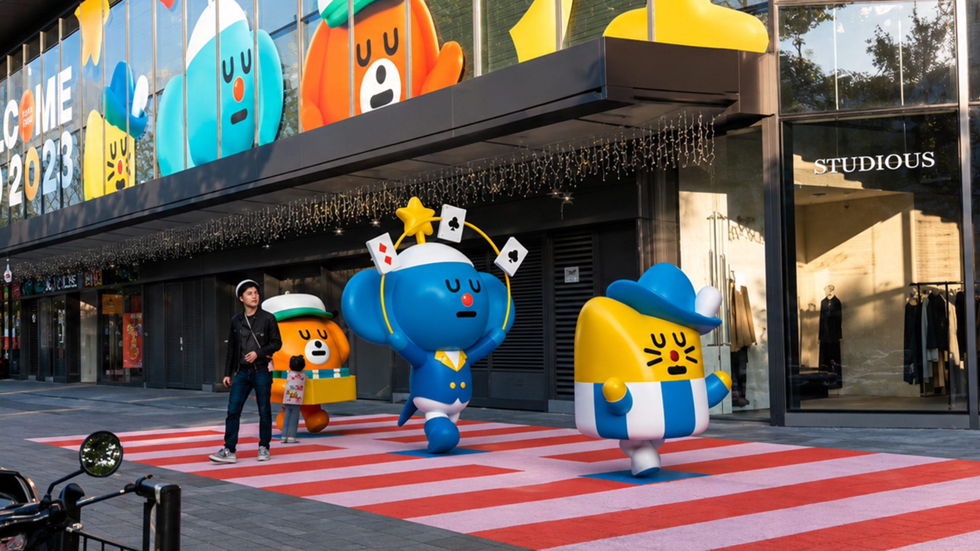 A colorful mascot parade brightens this sleek Chinese storefront