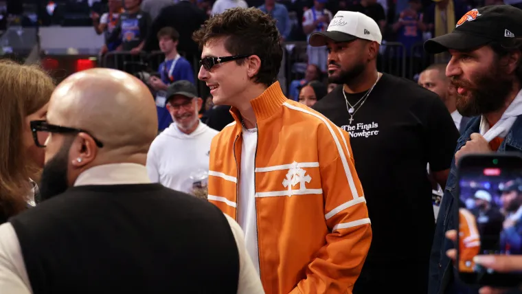 Timothee Chalamet outfit, explained: Knicks superfan's orange tracksuit ...