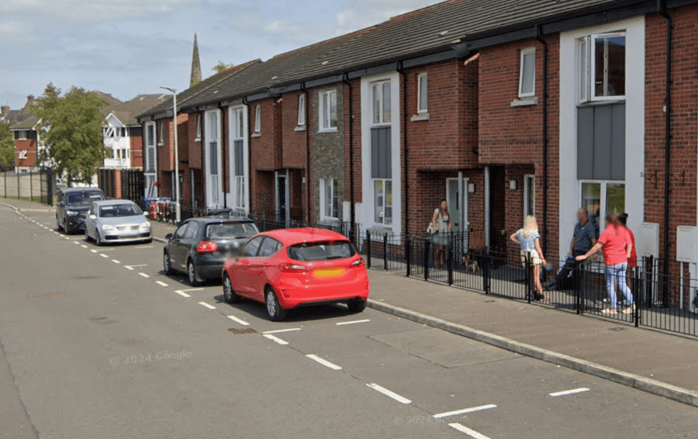 Man arrested following knife attack in Belfast as community left ...