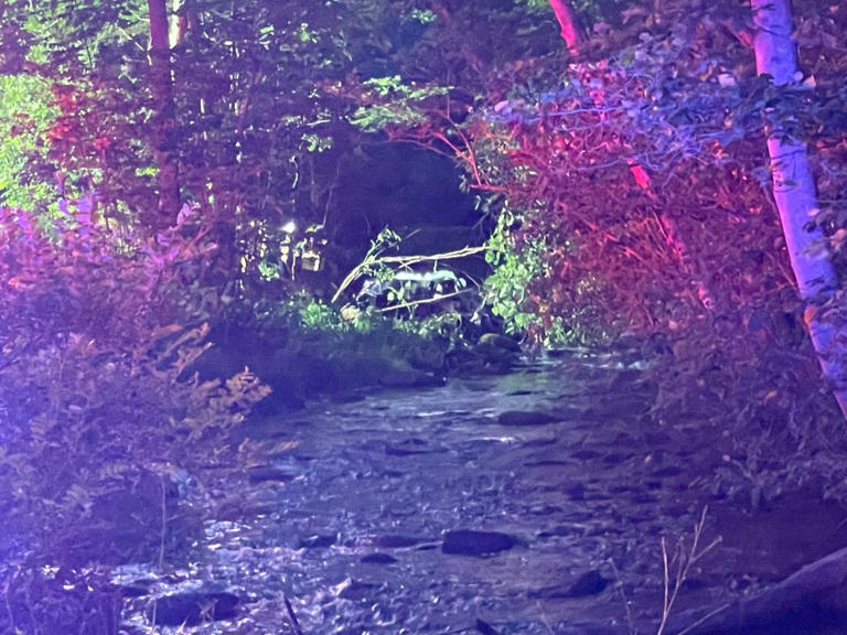 Crews respond after car crashes into local creek