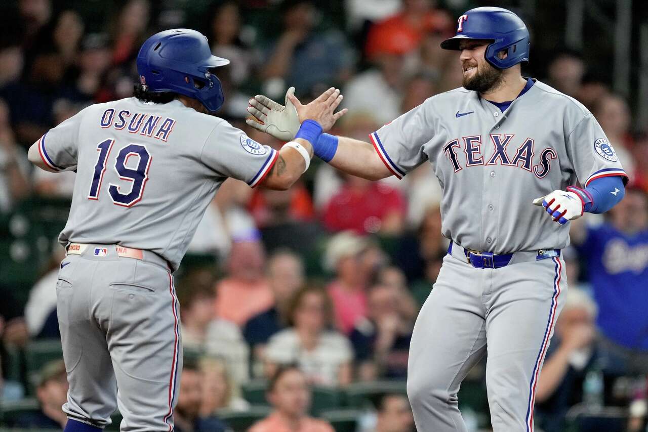 Chris Young explains Rangers' plan to get Alejandro Osuna reps at first ...
