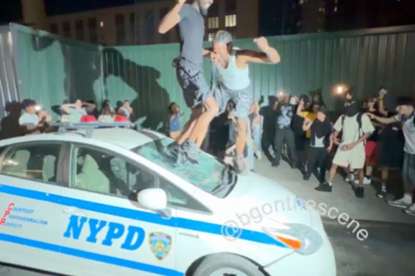 Riot police chase Knicks fans who smash up NYPD car as New York ...