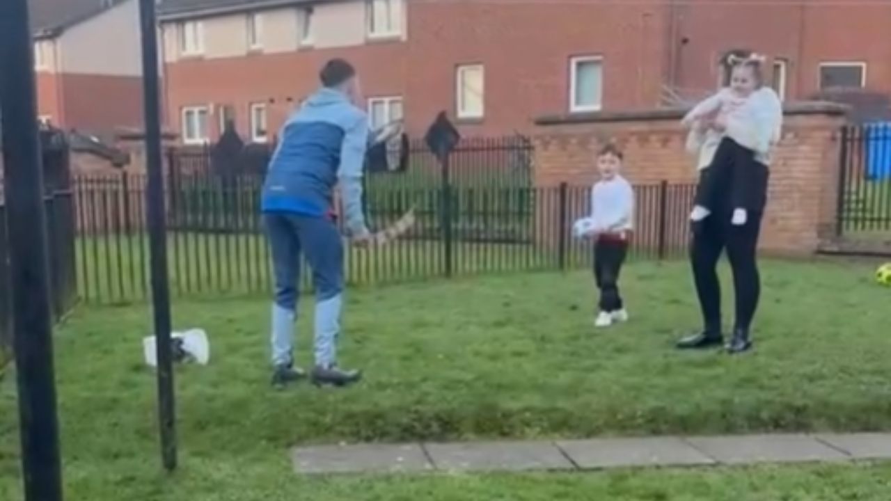 Football kick triggers blue smoke to reveal gender of baby
