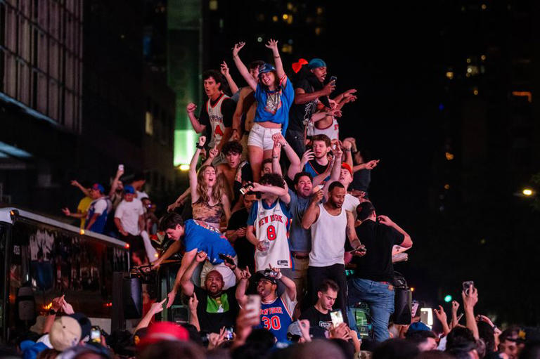 Unruly Knicks fans trash yellow bus as celebrations threaten to turn toxic