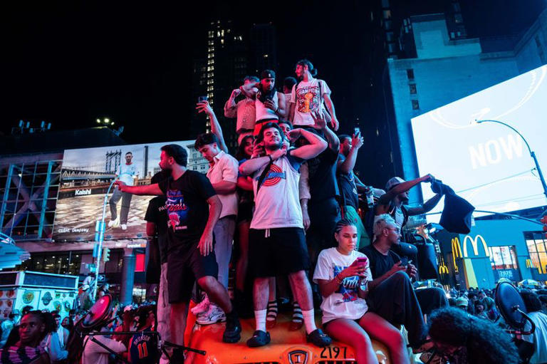 Unruly Knicks fans trash yellow bus as celebrations threaten to turn toxic