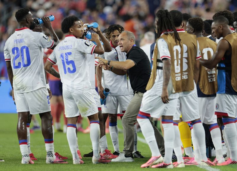 Soccer-Haiti must take belief from narrow Scotland defeat, says coach Migne