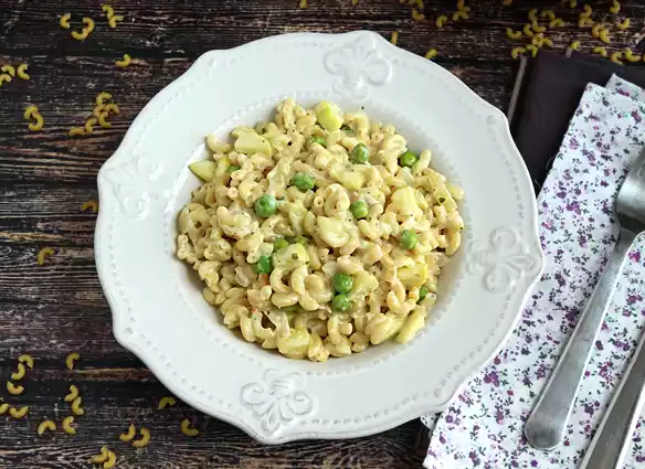 Risotto aux coquillettes, petits pois, courgettes, fromage ail et fines ...