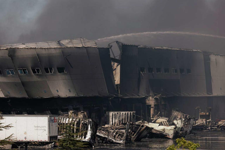 Massive Tracy warehouse fire could last a few more days as crews battle ...