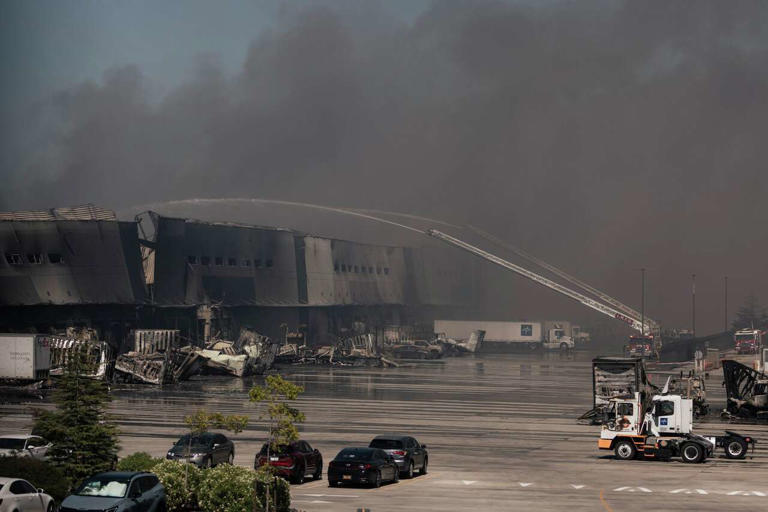 Massive Tracy warehouse fire could last a few more days as crews battle ...
