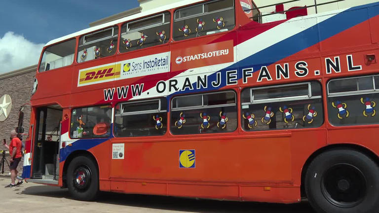 Netherlands soccer fans bring massive orange block party and iconic bus ...