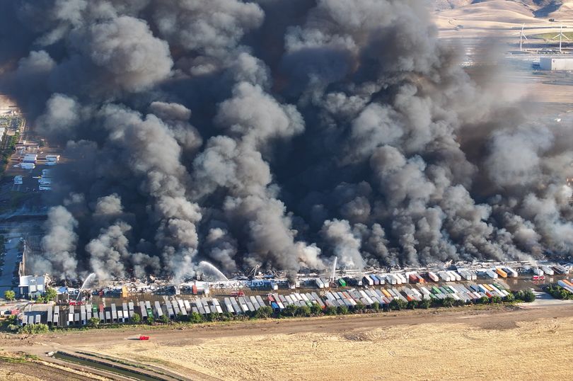Residents told to stay indoors as toxic smoke from massive fire engulfs ...