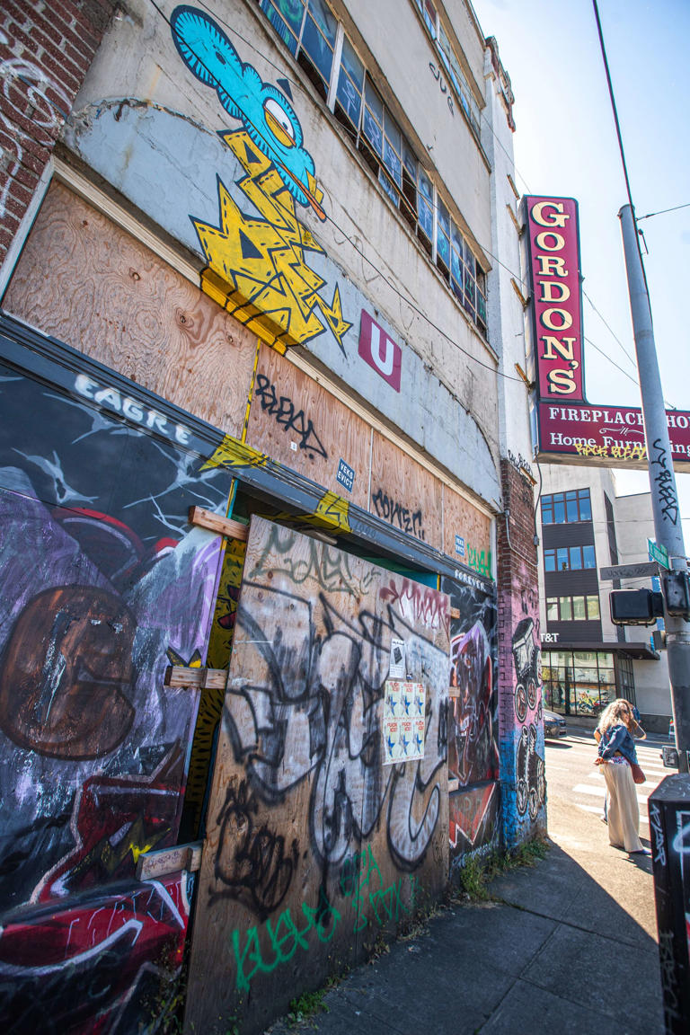 Contractors clean graffiti from a conspicuous Portland eyesore