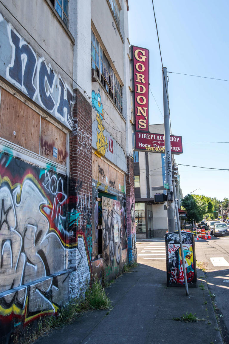 Contractors clean graffiti from a conspicuous Portland eyesore