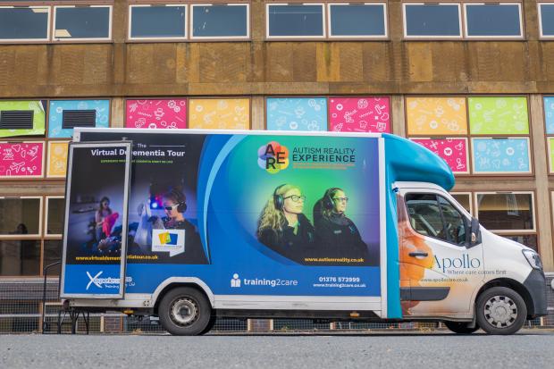 Reality bus brings autism awareness experience to college students