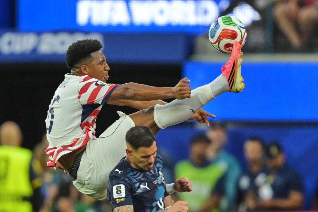 One extraordinary photo: Alex Freeman's leap over Paraguay