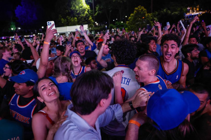 Riot police chase Knicks fans who smash up NYPD car as New York ...