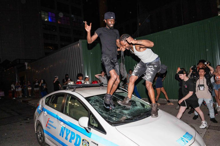 New York Knicks fans riot as bus in flames, gunshots fired and police ...