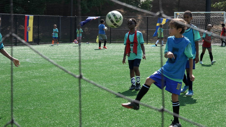 Meet the young Atlanta athletes escorting players onto the World Cup stage
