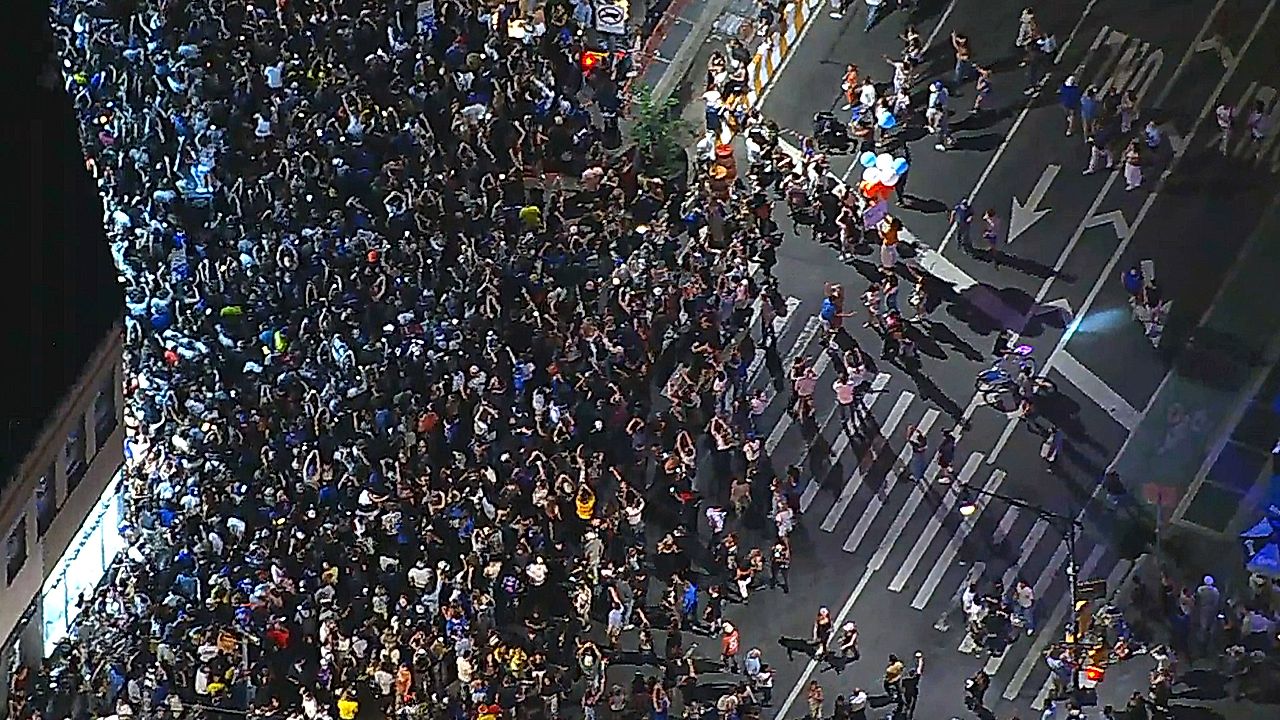 Fans celebrate across NYC as New York Knicks win first NBA championship ...