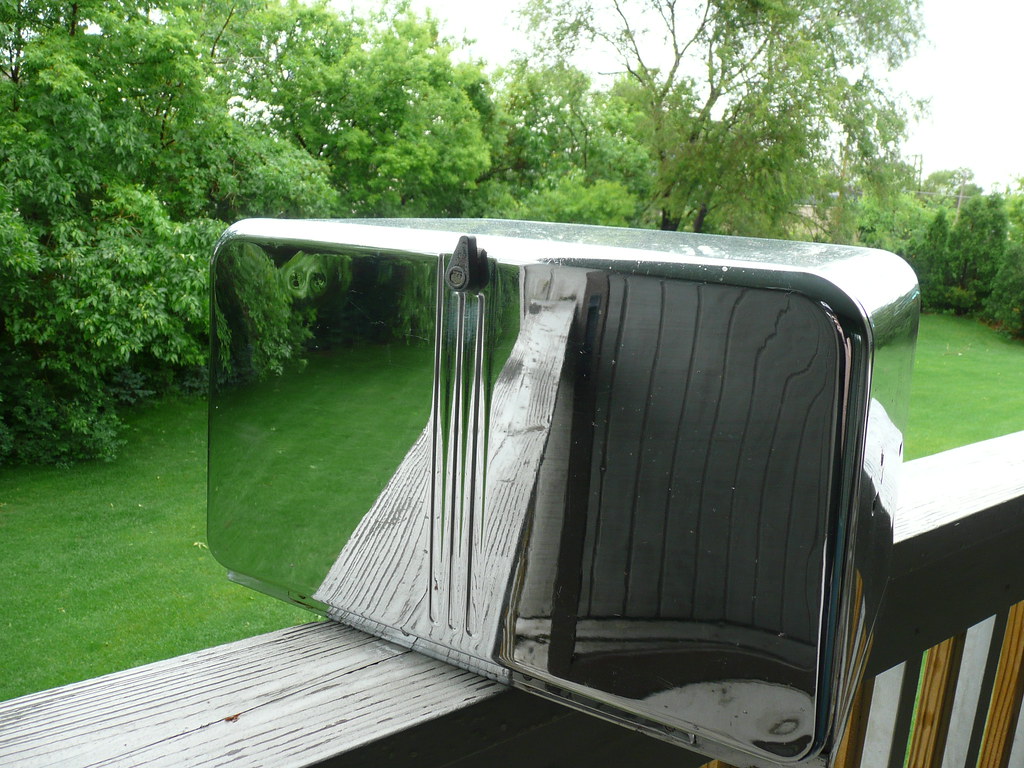 Antique bread boxes and kitchen canisters from the mid-century era that ...