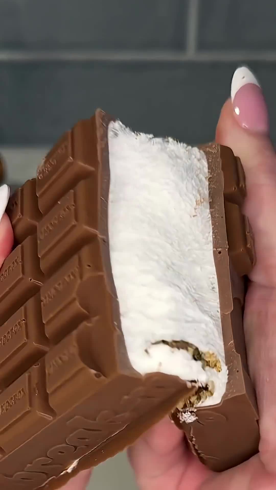 Chocolate bar stuffed with marshmallow and graham for portable s'mores