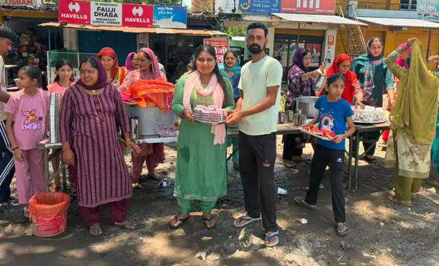 Community comes together to provide refreshing relief during summer heat