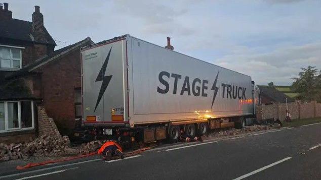 Band's truck hits house on way to Download