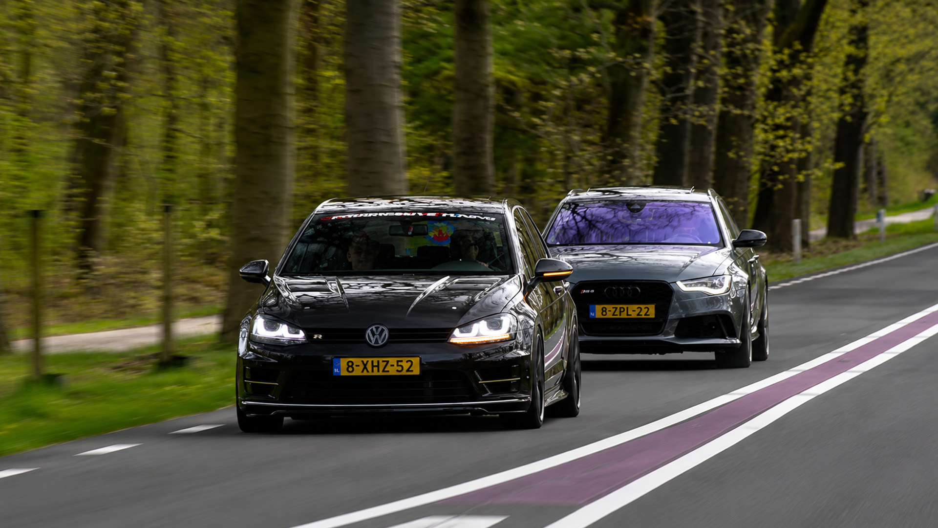 Audi RS6 chases VW Golf R through forest roads