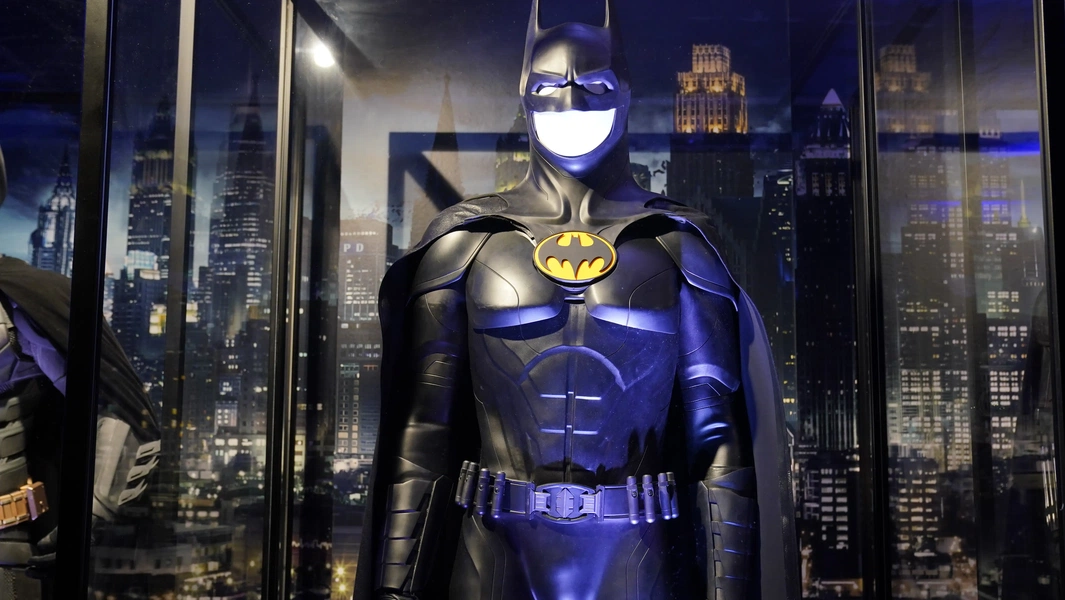 4 iconic Batman costume transformations